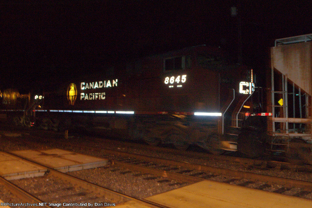 CP AC44CW 8645 trails on K049-28